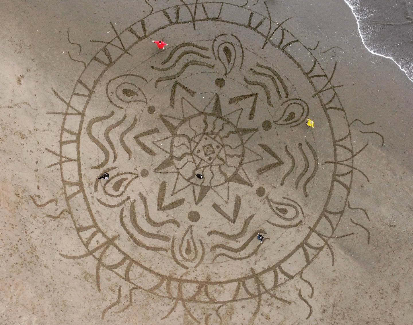 Artists Lead Sand Art Workshop, Create Temporary Piece on Ocean Beach