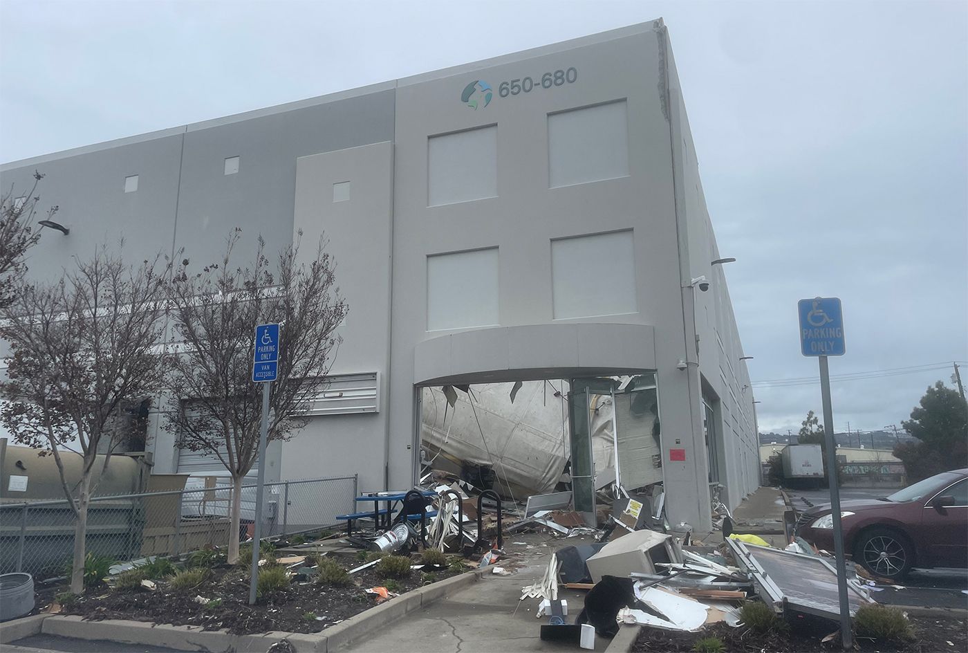 Roof Collapse Kills One, Injures Another at Coffee Warehouse In Oakland